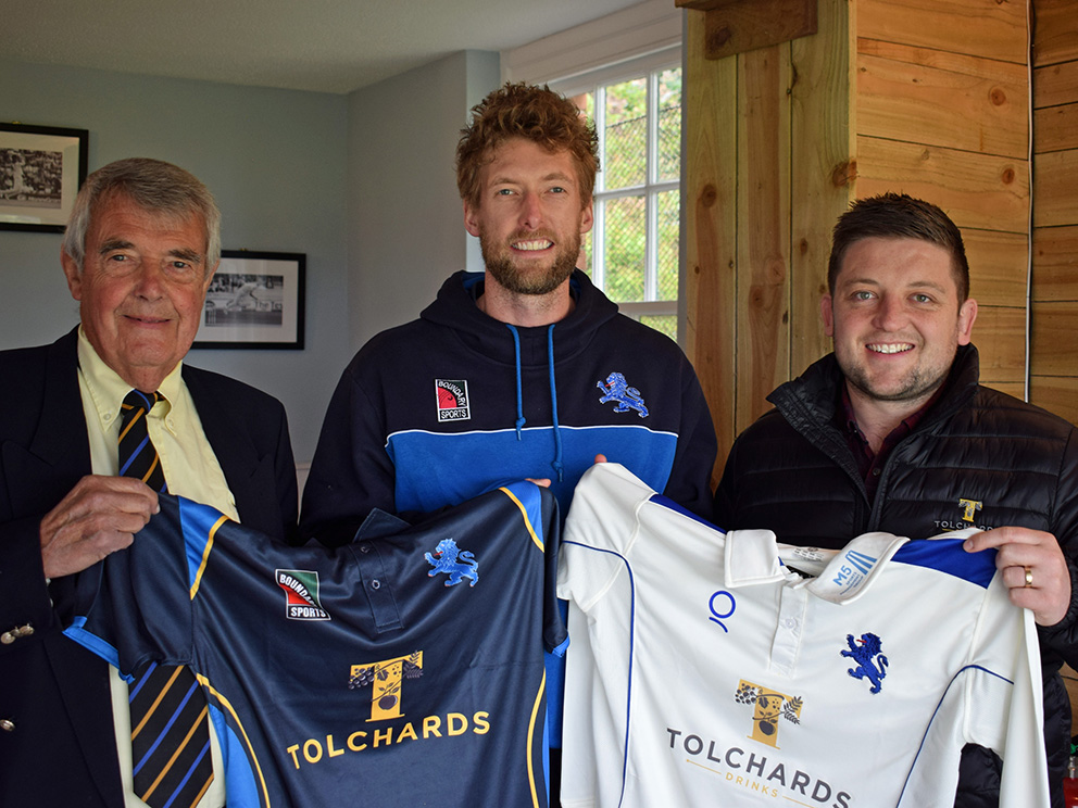 County club thank sponsor for support by presenting them with team shirts - Devon Cricket